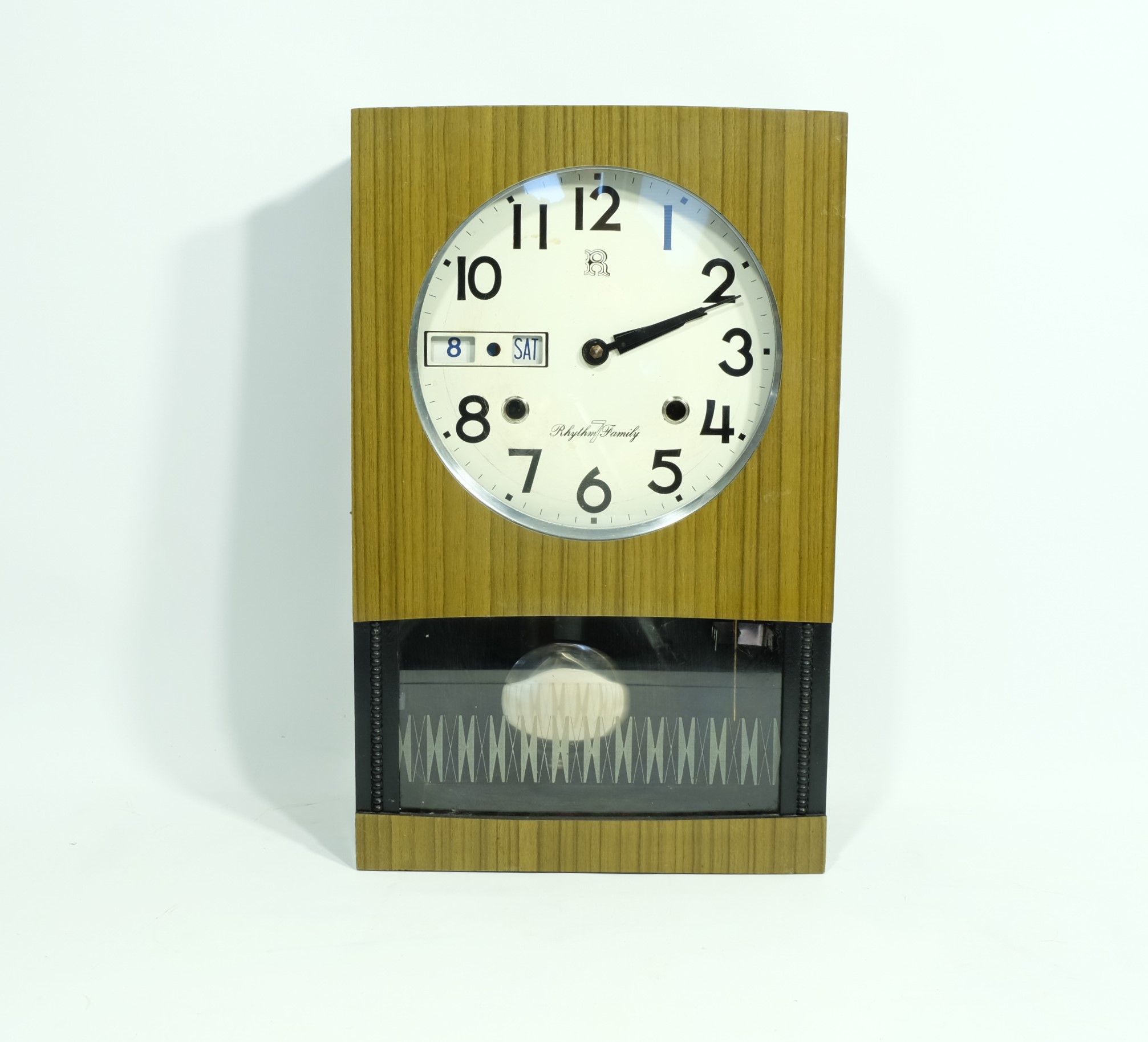 Rhythm Pendulum Wall Clock - Function In Form